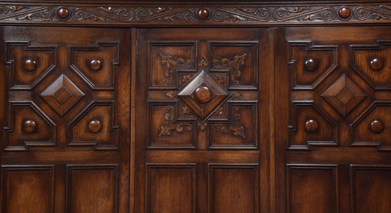 Jacobean Style Carved Oak Three-Door Wardrobe at 1stDibs