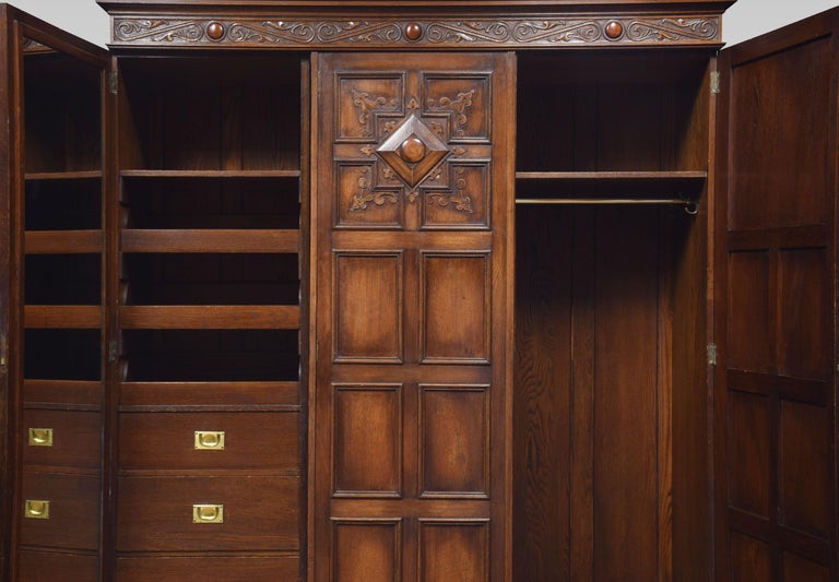 Jacobean Style Carved Oak Three-Door Wardrobe at 1stDibs