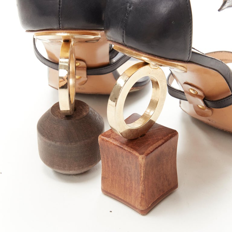 JACQUEMUS Runway architectural wood block gold ring black strappy heel ...