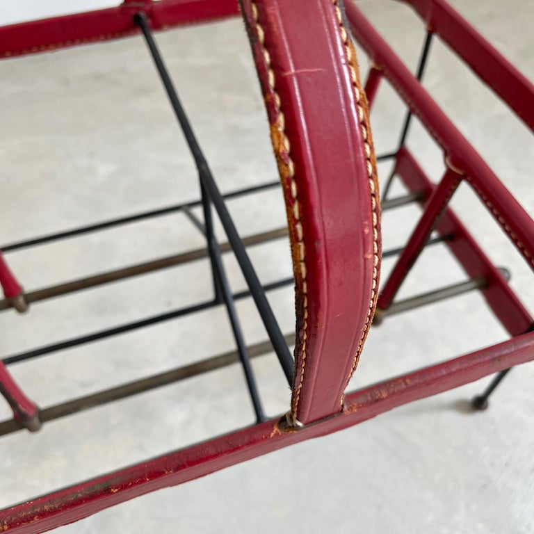 Jacques Adnet Red Leather and Metal Book Rack, 1950s For Sale at 1stDibs