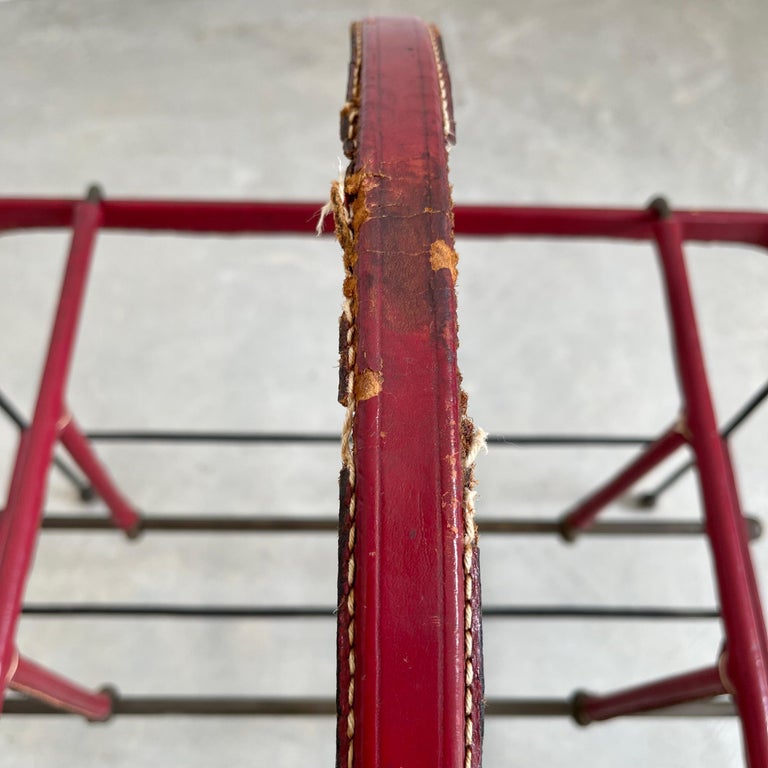 Jacques Adnet Red Leather and Metal Book Rack, 1950s For Sale at 1stDibs