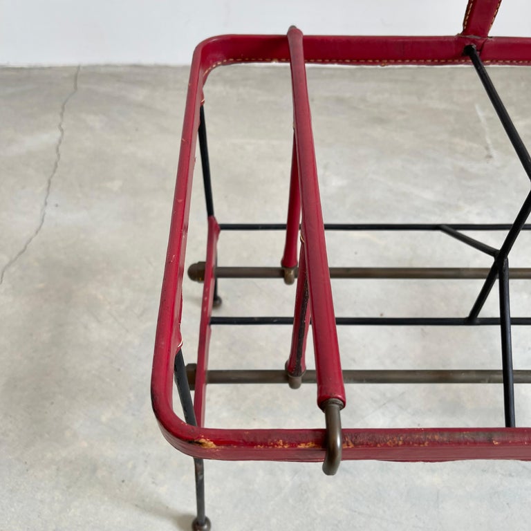 Jacques Adnet Red Leather and Metal Book Rack, 1950s For Sale at 1stDibs