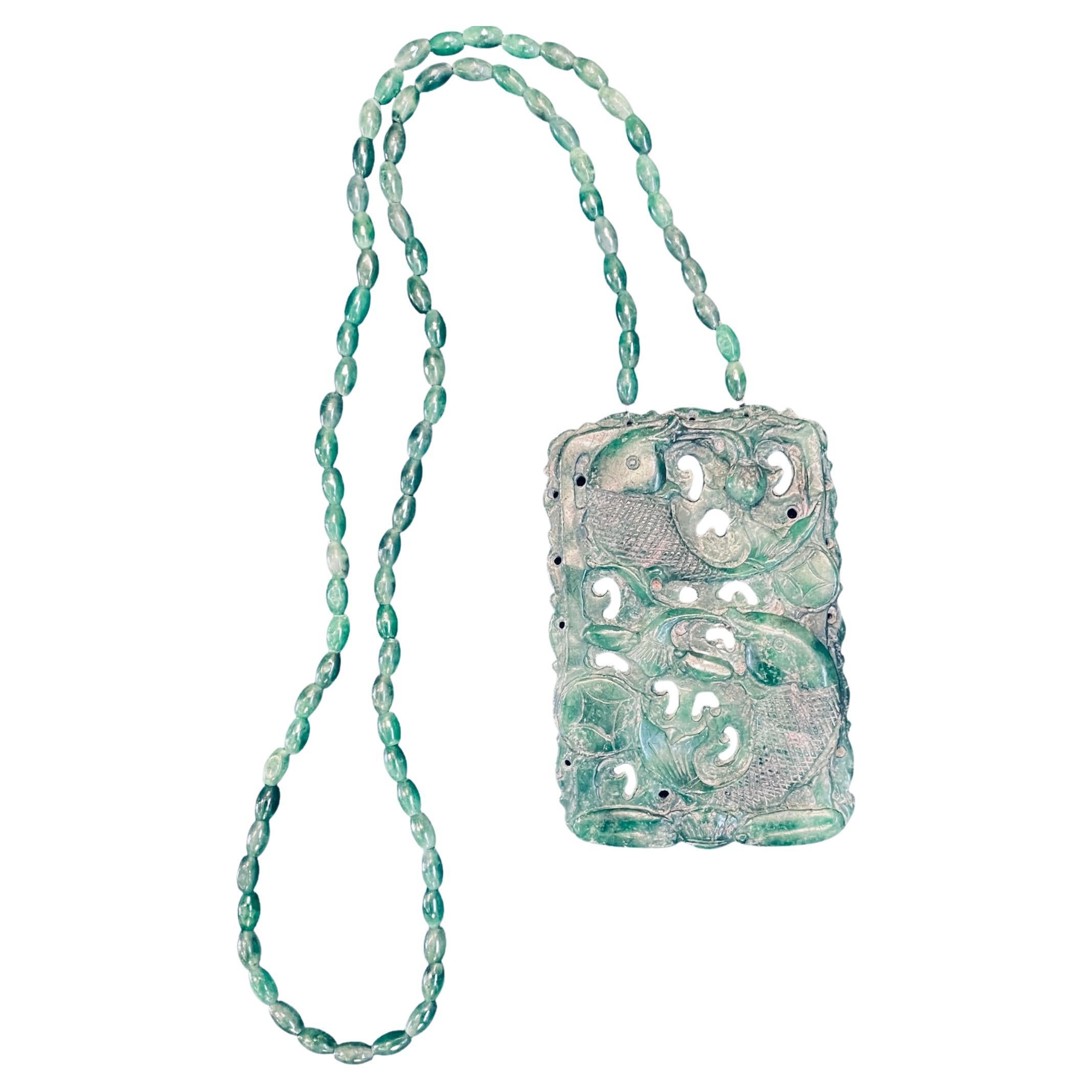 Jade Necklace With Carved Pendant For Sale at 1stDibs