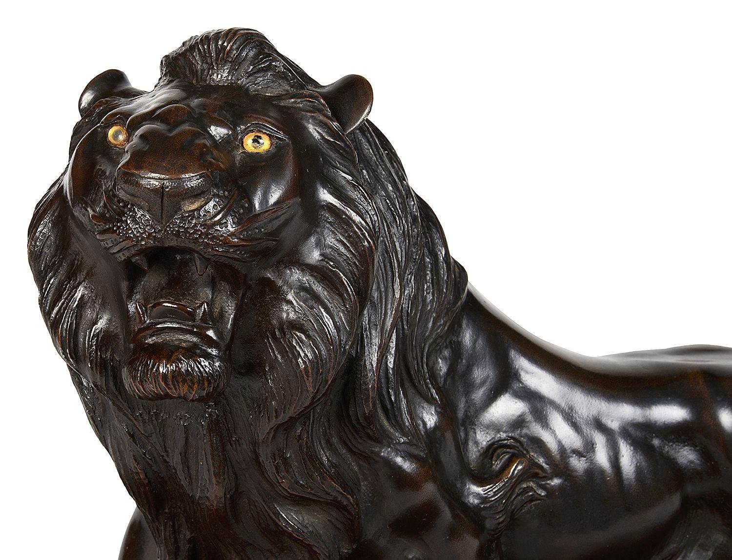 Japanese Meiji period bronze Lion on stand. For Sale at 1stDibs