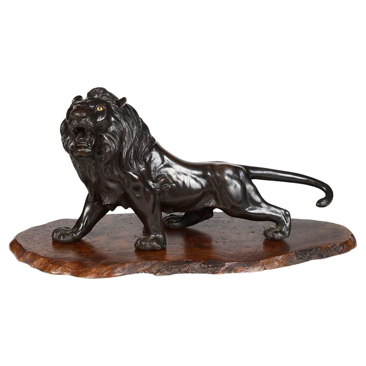 Japanese Meiji period bronze Lion on stand. For Sale at 1stDibs