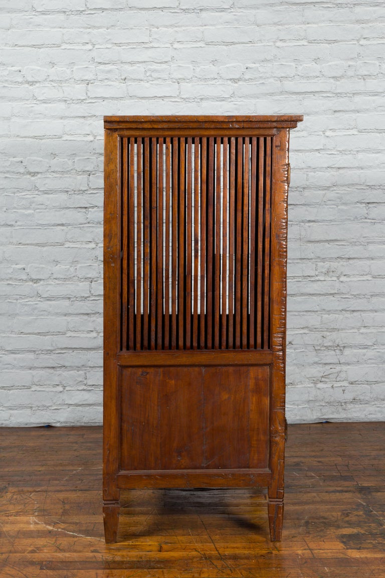 Javanese Antique Teak Armoire with Slatted Motifs, Tapered Feet and ...