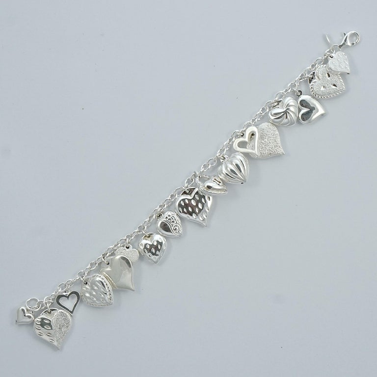 JCM Polished and Textured Sterling Silver Heart Charm Bracelet at 1stDibs