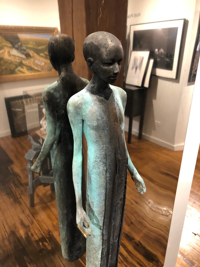 Jesus Curia Perez - Library - Bronze Wall Sculpture Floats in Front of ...