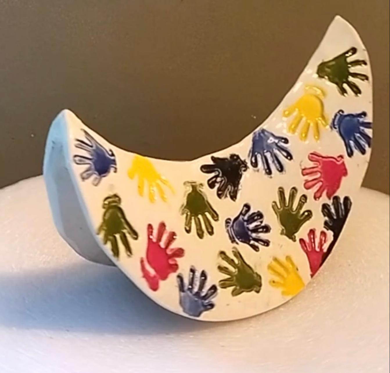 Jim Pallas - Slappy Moon (multi-colored hands on white moon), Jim ...