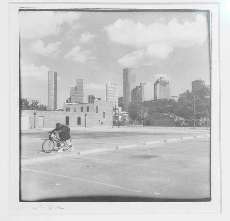 Jim Reitz - Black and White Urban Photograph of a Man with a Bike ...