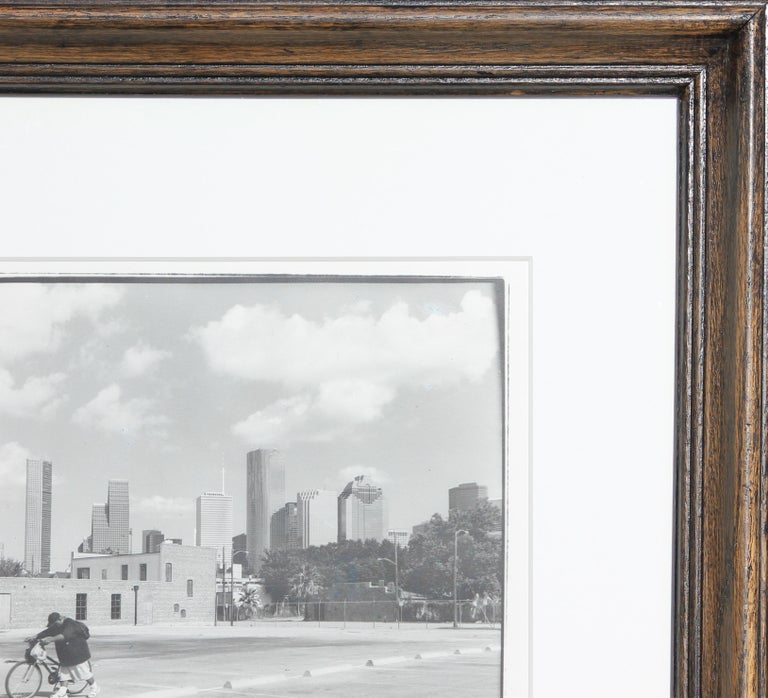 Jim Reitz - Black and White Urban Photograph of a Man with a Bike ...