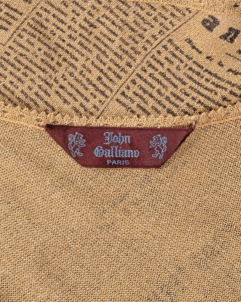 John Galliano gold lurex bias cut evening dress with newsprint motif, ss 2001 at 1stDibs