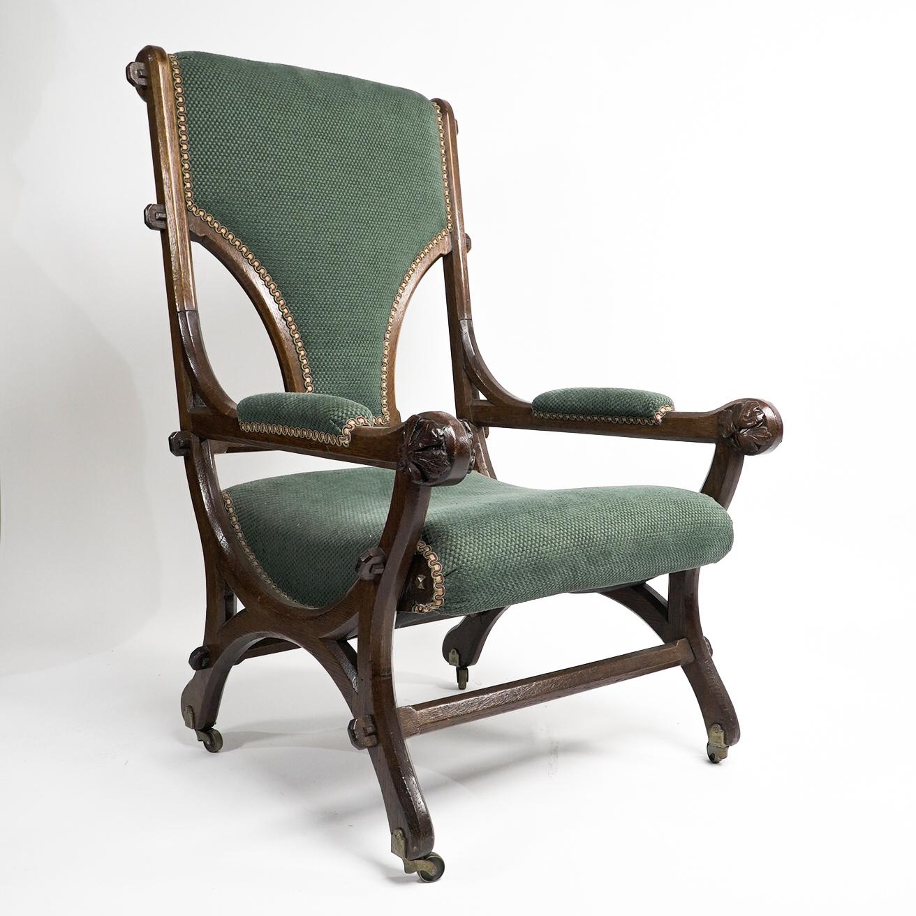 John Pollard Seddon A oak armchair with through pegged tenon joints For ...
