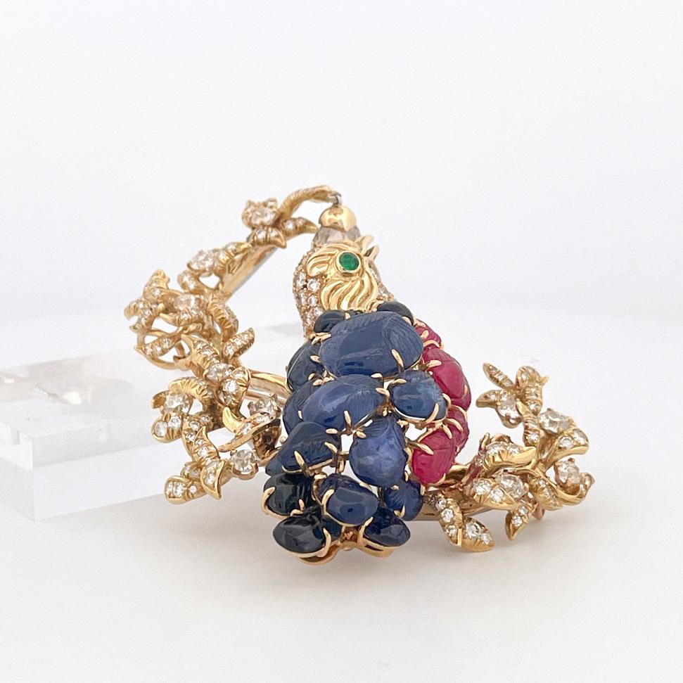 Julius Cohen 1970's 18k Yellow Gold Ruby and Sapphire Bird Pin For Sale at 1stDibs