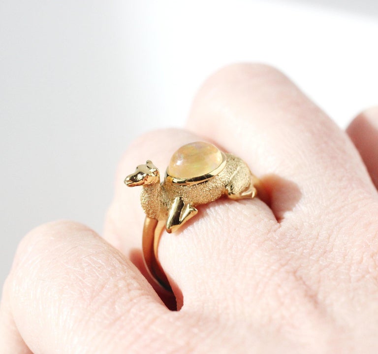 Julius Cohen Fire Opal Camel Ring in 22 Kt Gold For Sale at 1stDibs