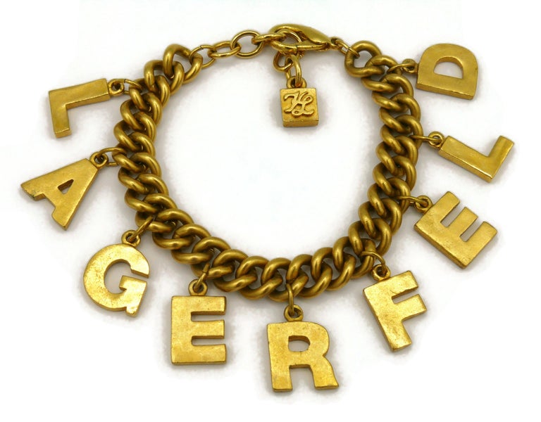 KARL LAGERFELD Vintage Gold Tone Lettering Charm Bracelet For Sale at ...