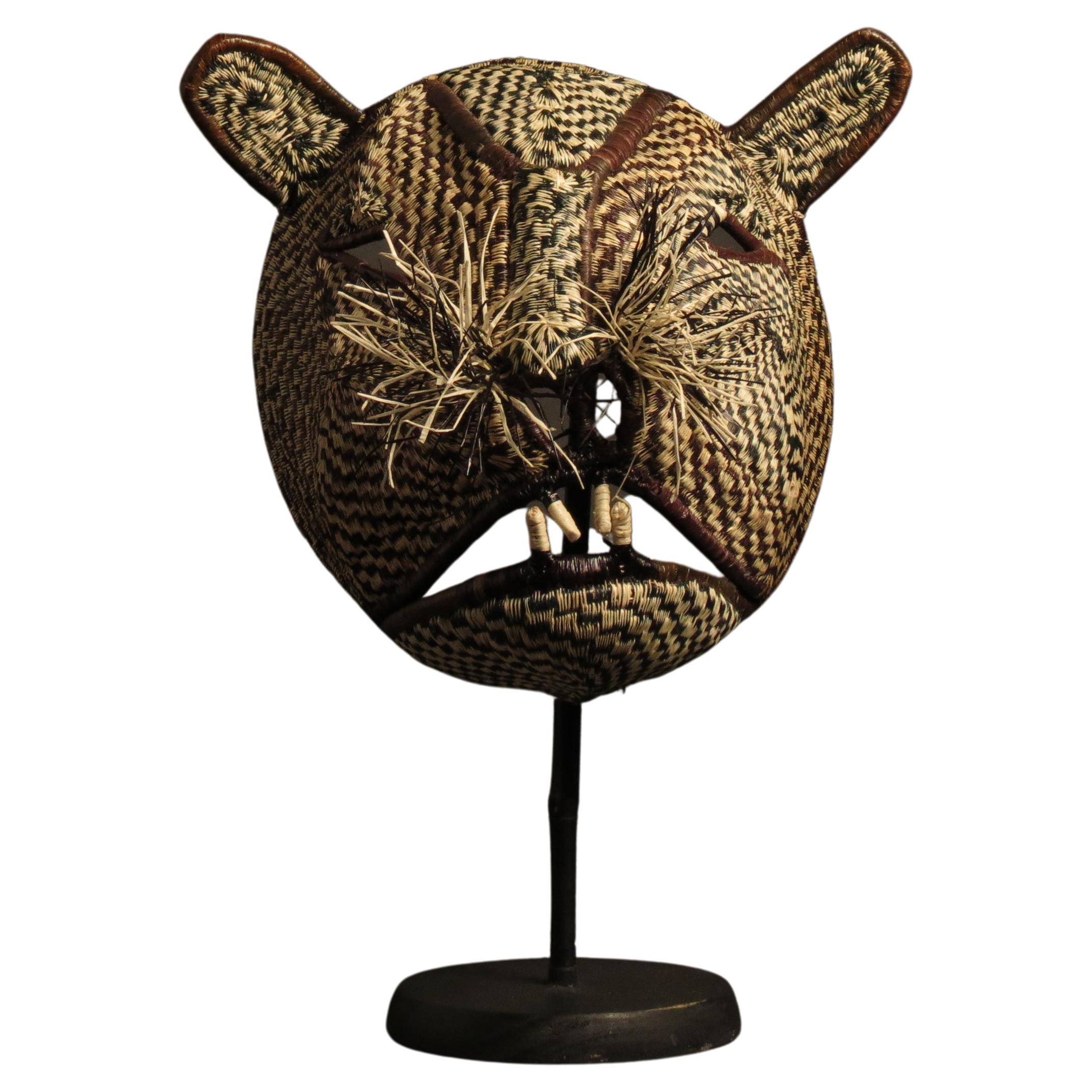 Black and white handwoven tribal animal mask For Sale at 1stDibs