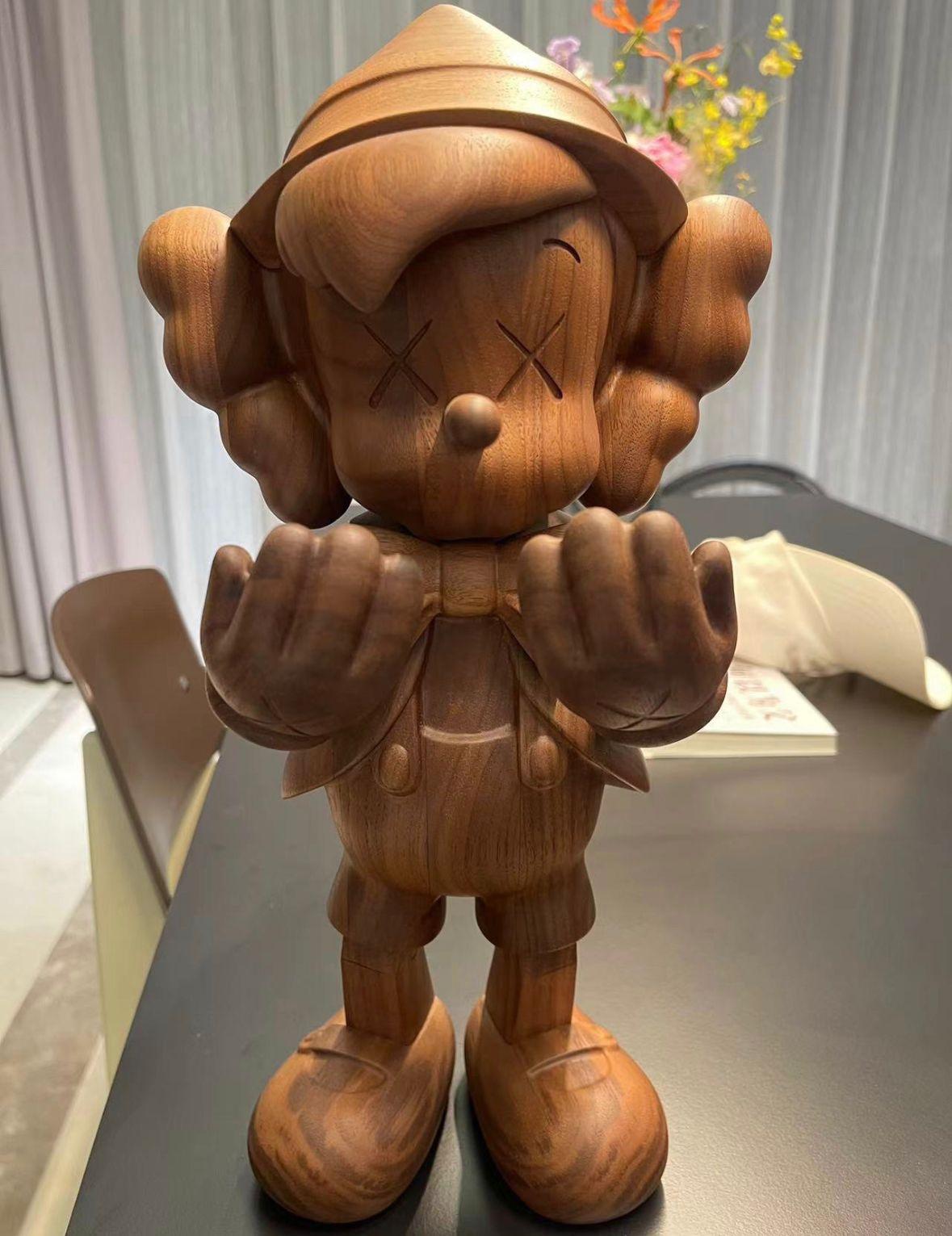 KAWS - Kaws Pinocchio (Karimoku Wood Version) For Sale at 1stDibs