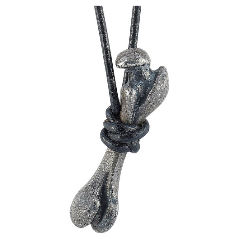 King Baby Silver Bone Pendant Necklace For Sale at 1stDibs