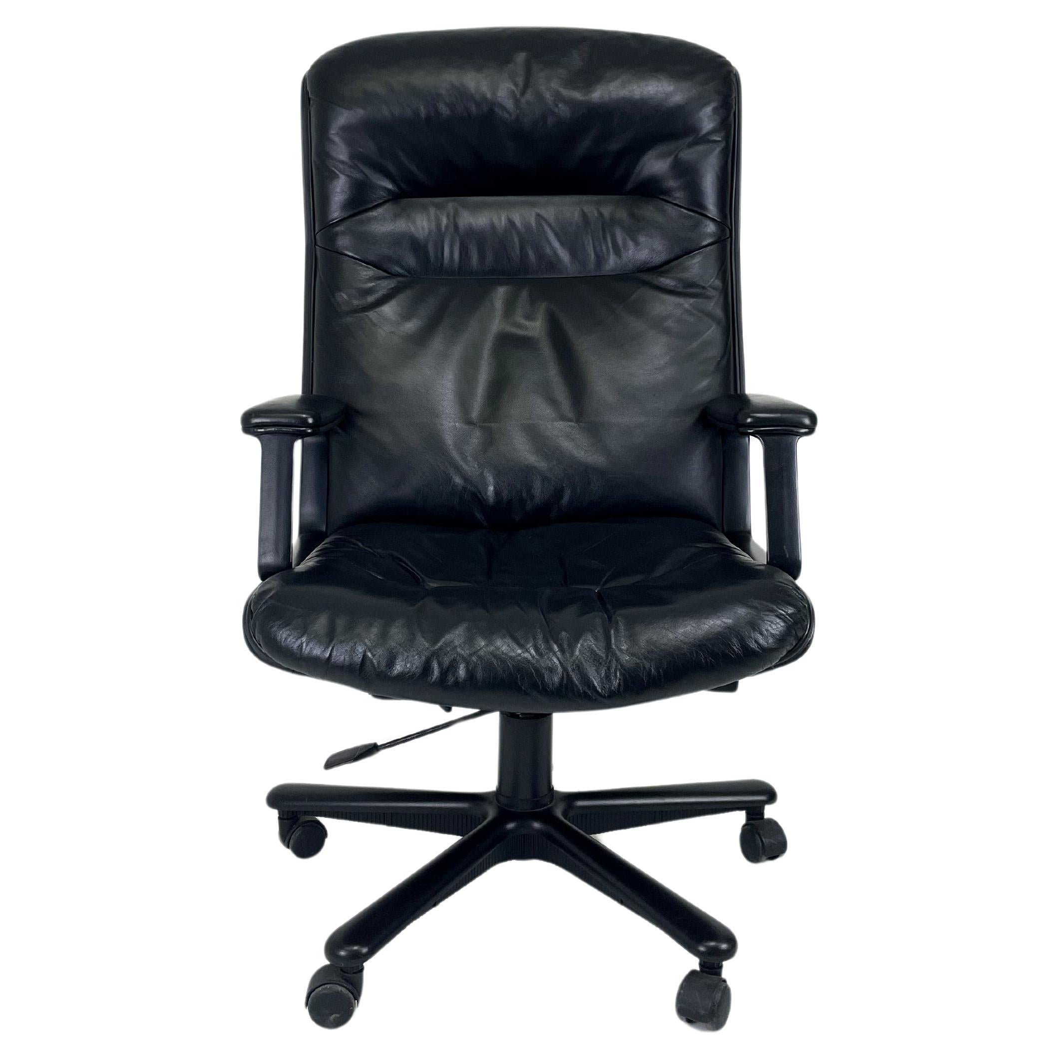 Mod. Kiruna leather and wood swivel armchair by Studio Tecnico Vaghi ...
