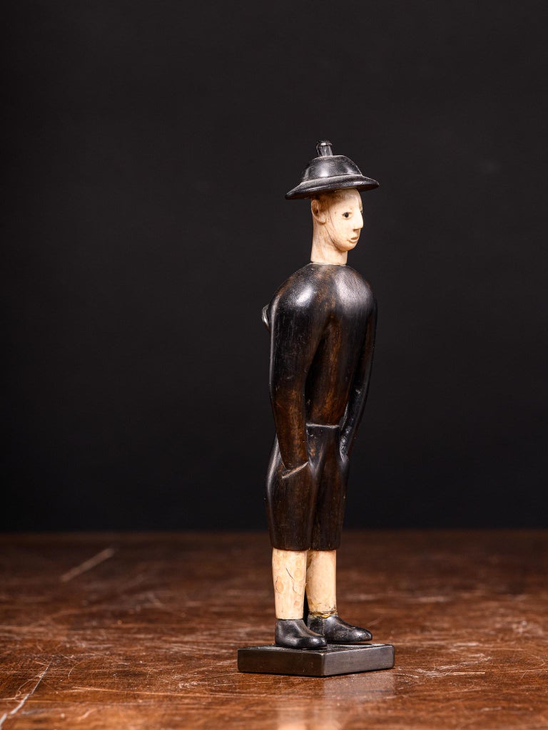 Kongo Wooden statue depicting Chinese worker waring typical hat, DRC ...