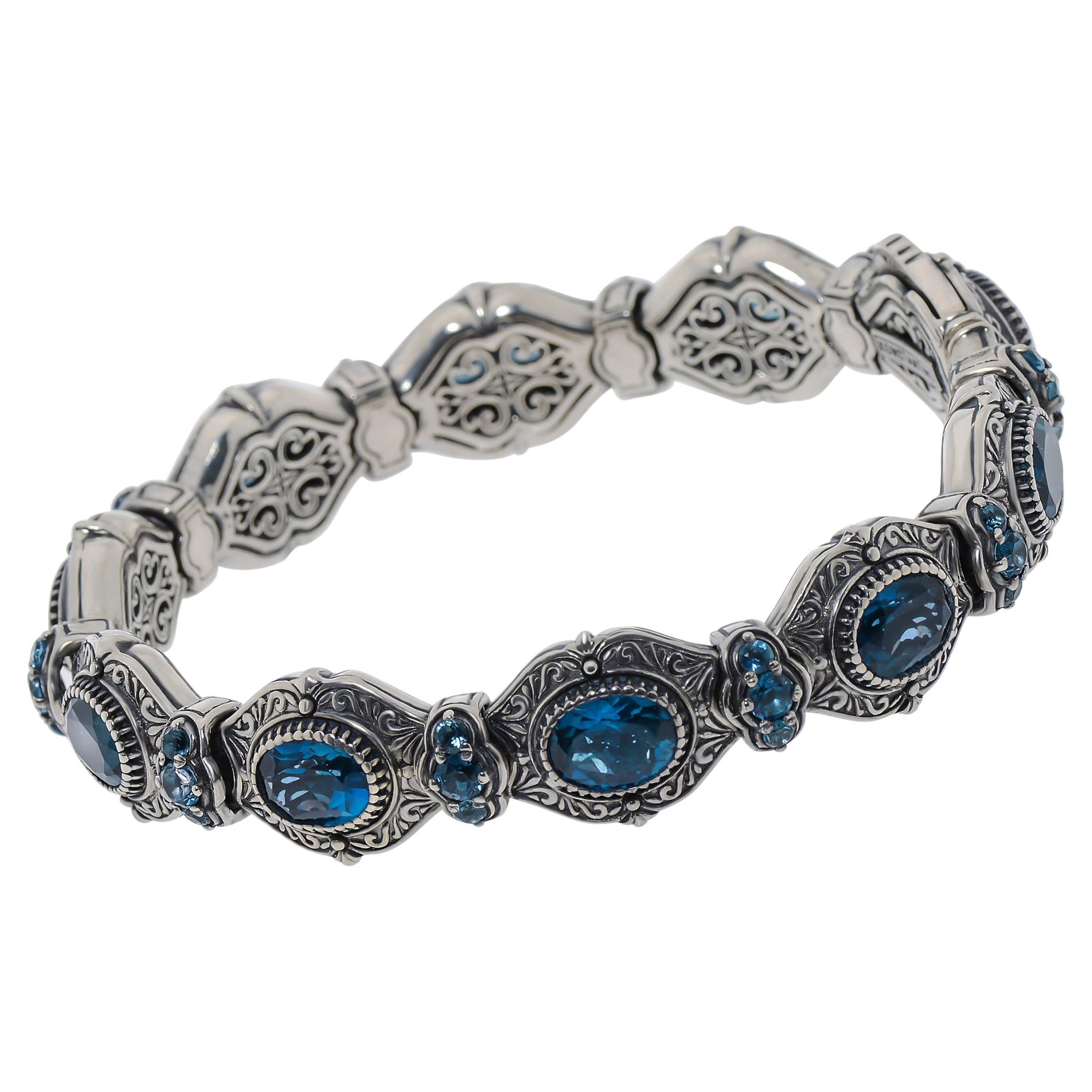 Platinum Sterling Silver Aquamarine Blue Topaz Bangle For Sale at 1stDibs