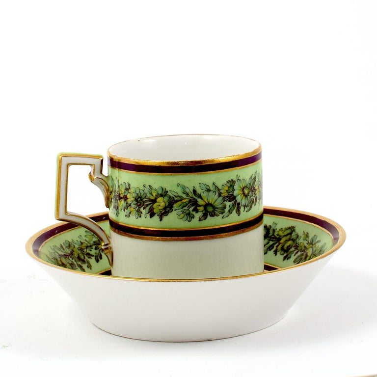 KPM Empire Porcelain Cup and Saucer Decorated with a Green Flower ...