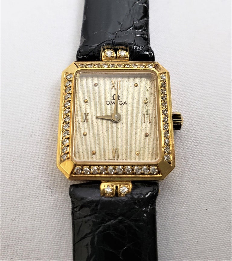 Ladies 18 Karat Yellow Gold and Diamond Omega Wrist Watch and Original ...