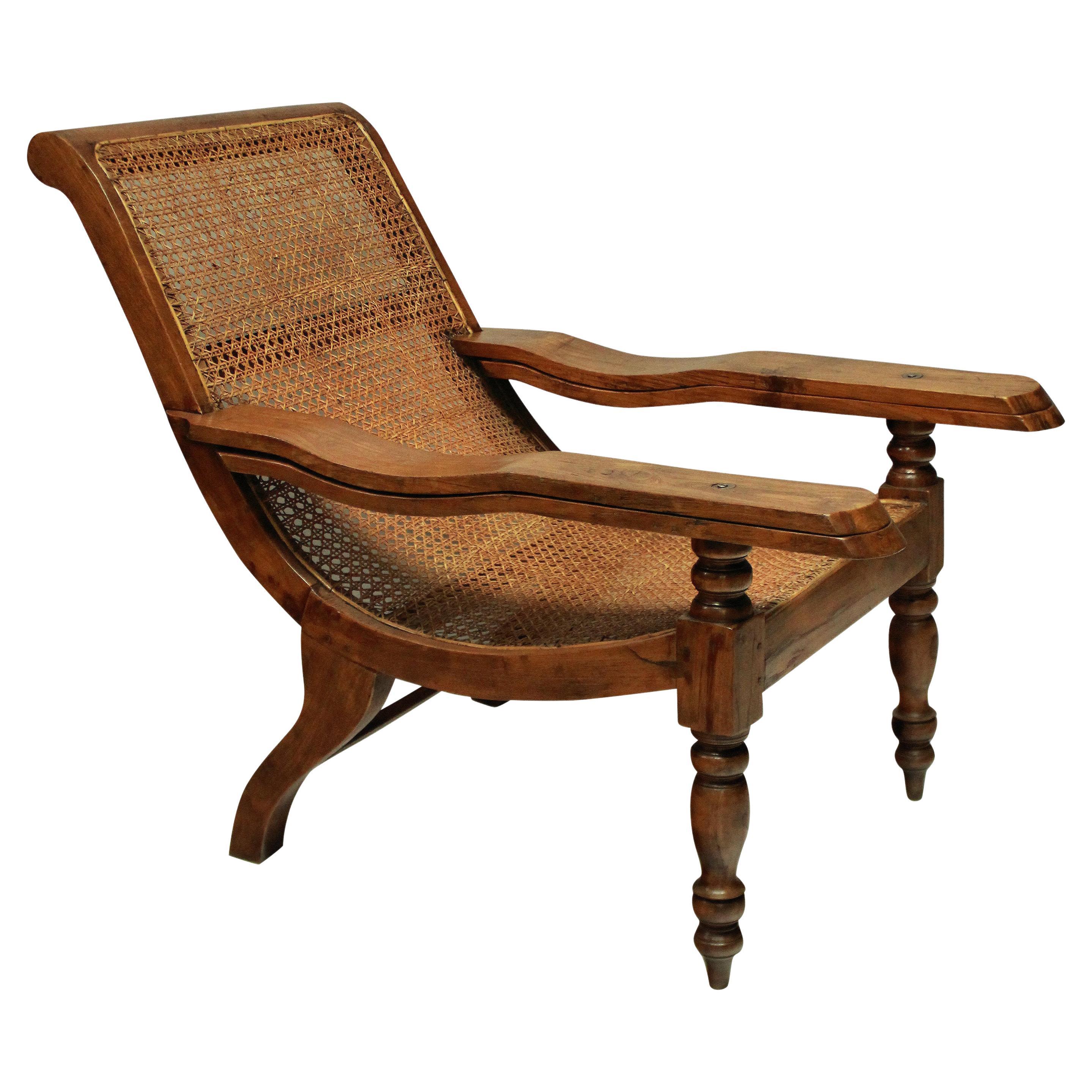 Large 19th Century Solid Teak Colonial Plantation Chair For Sale at 1stDibs