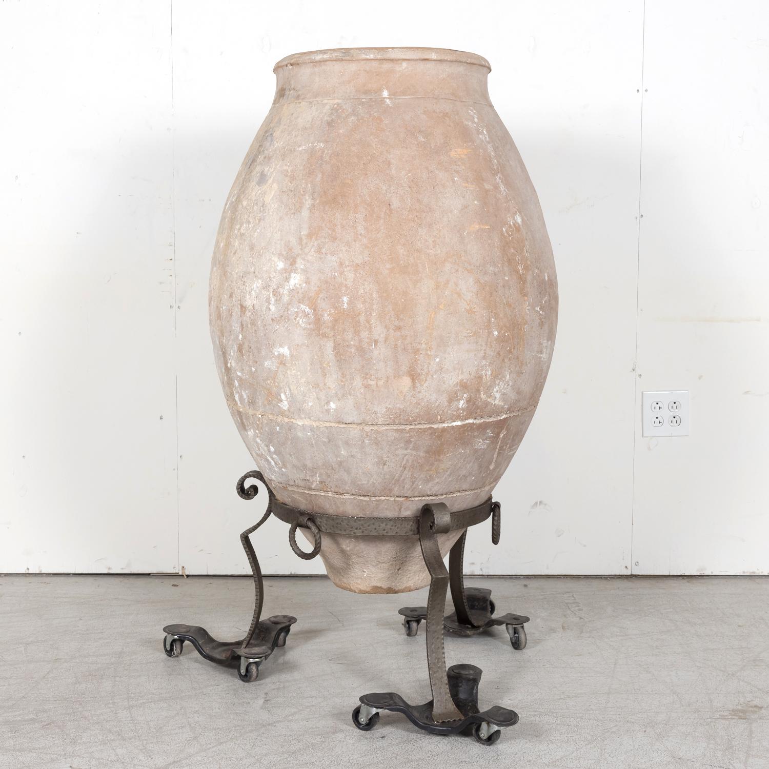 Large 19th Century Spanish Terracotta Olive Jar with Iron Stand, Signed ...