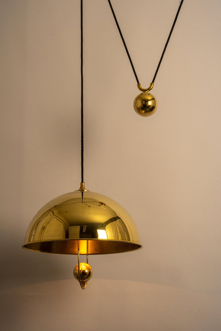Large Adjustable Brass Counterweight Pendant Light by Florian Schulz ...