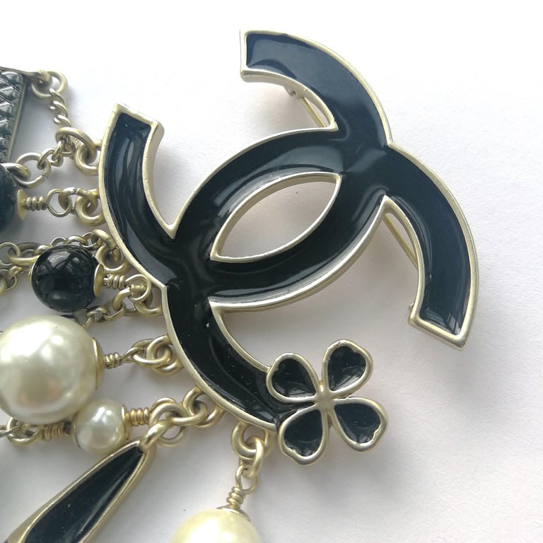 Large black enamelled and silvered metal Double C 'charm' brooch ...