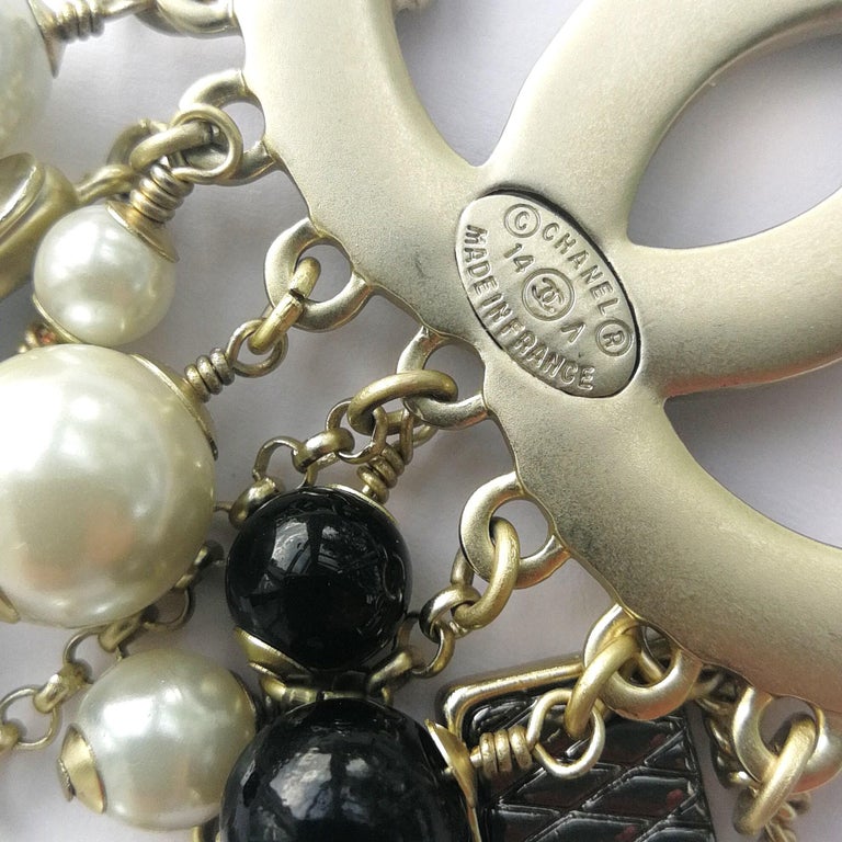 Large black enamelled and silvered metal Double C 'charm' brooch ...