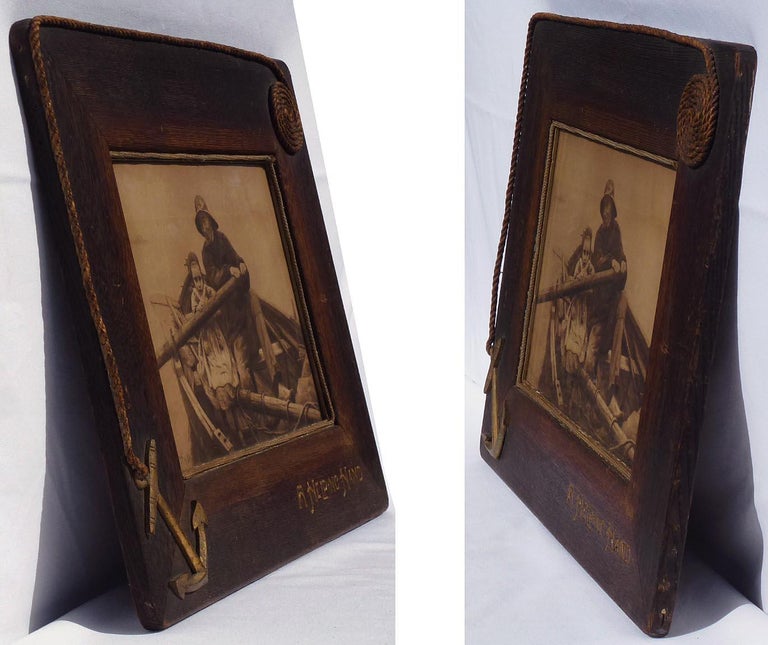 Large Carved Frame Decorated with a Nautical Theme and Holding a ...