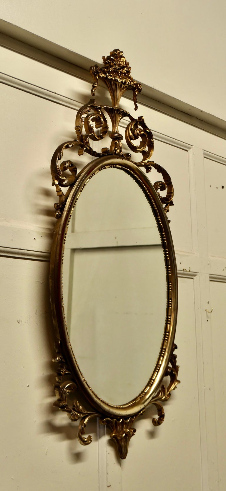 Large Gold Crested Rococo Style Oval Wall Mirror For Sale at 1stDibs