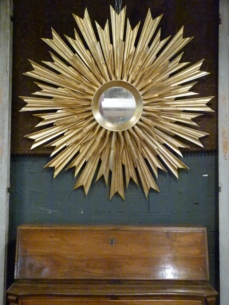 Large mid-century three layered gold-wood sunburst wall mirror. For ...