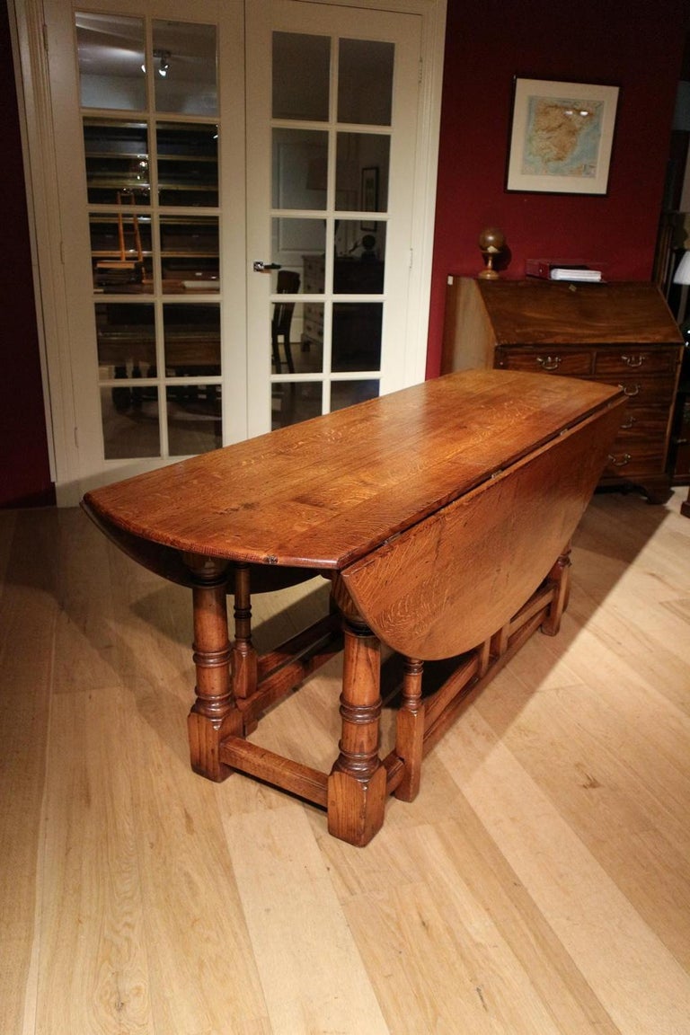 Large oak drop leaf table at 1stDibs