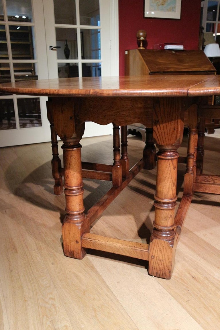 Large oak drop leaf table at 1stDibs