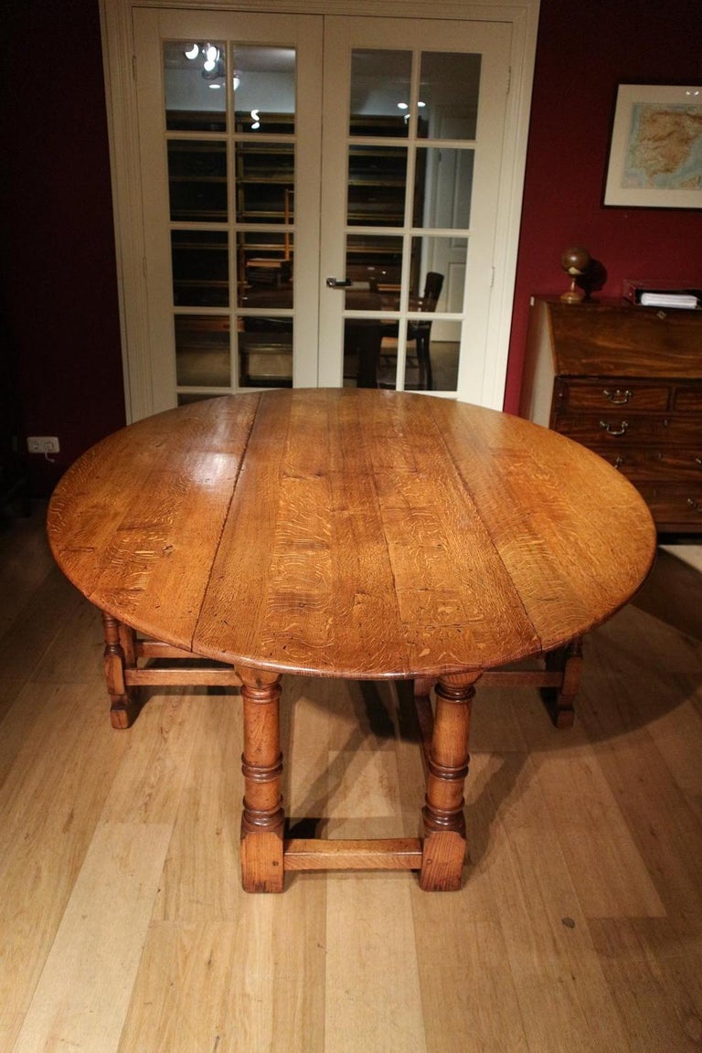 Large oak drop leaf table at 1stDibs