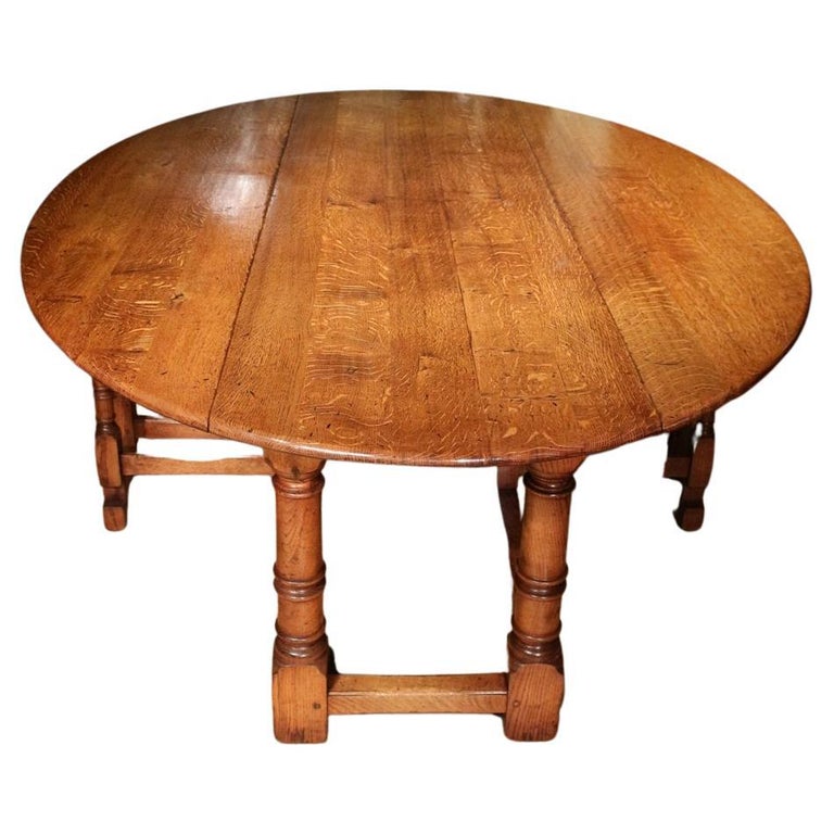 Large oak drop leaf table at 1stDibs