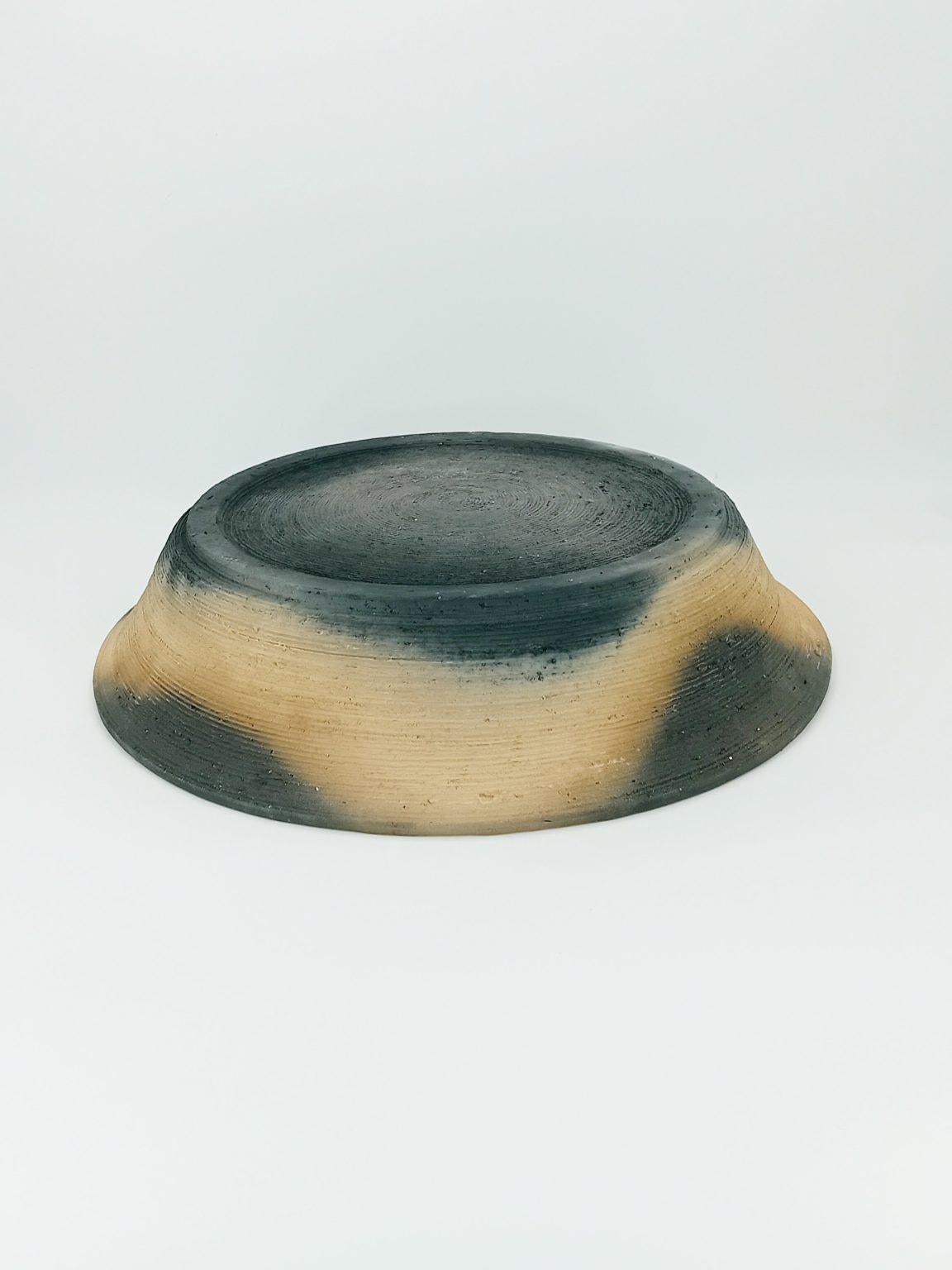 Large plate in ash-glazed terracotta and red lacquer For Sale at 1stDibs