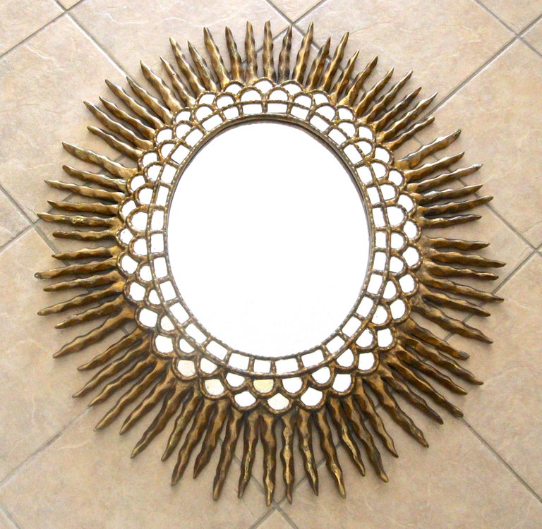 Large Sunburst Oval Giltwood Spanish Colonial Wall Mirror at 1stDibs
