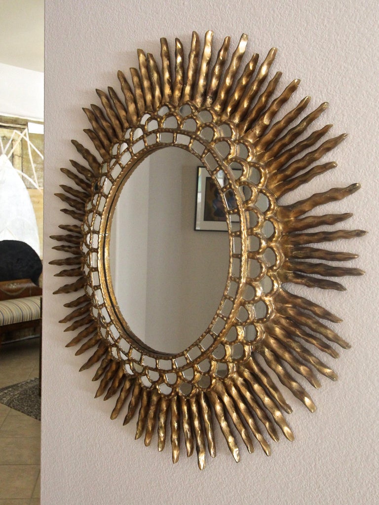 Large Sunburst Oval Giltwood Spanish Colonial Wall Mirror at 1stDibs