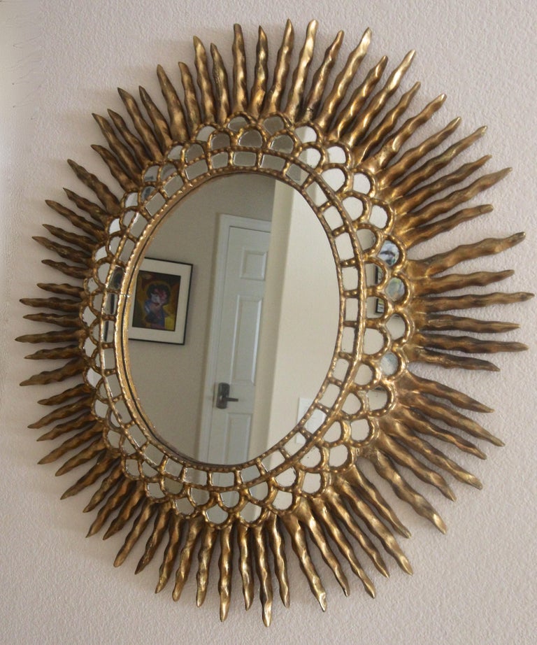 Large Sunburst Oval Giltwood Spanish Colonial Wall Mirror at 1stDibs