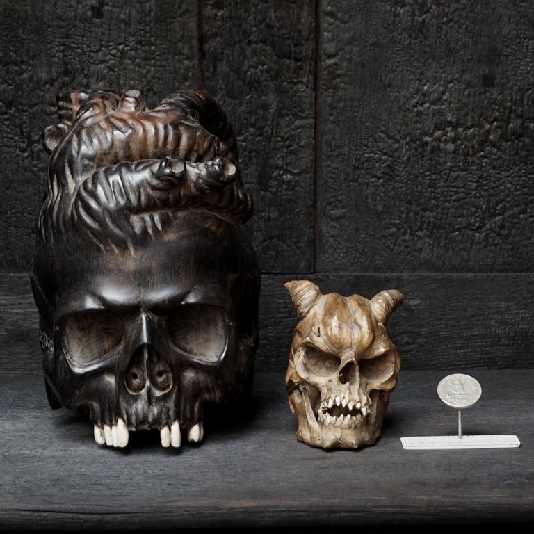 Large Wooden Hand-Carved Ebony Heart Skull and Small Demon Skull at 1stDibs