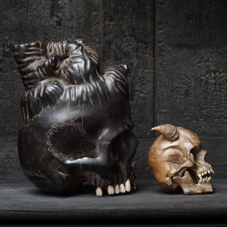 Large Wooden Hand-Carved Ebony Heart Skull and Small Demon Skull at 1stDibs