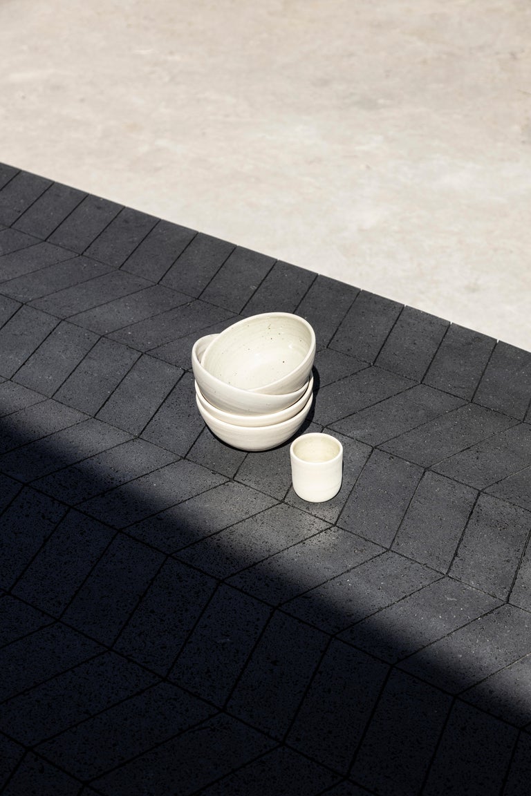 Lava Oval Table, Volcanic Rock and Black Stainless Steel at 1stDibs