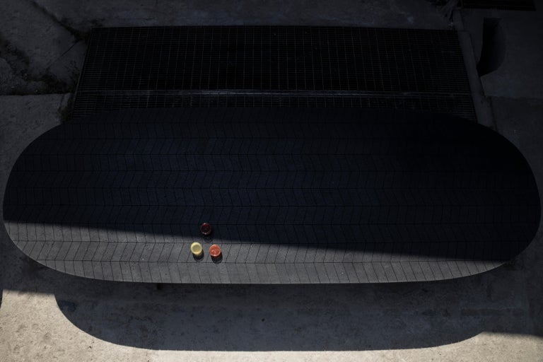 Lava Oval Table, Volcanic Rock and Black Stainless Steel at 1stDibs
