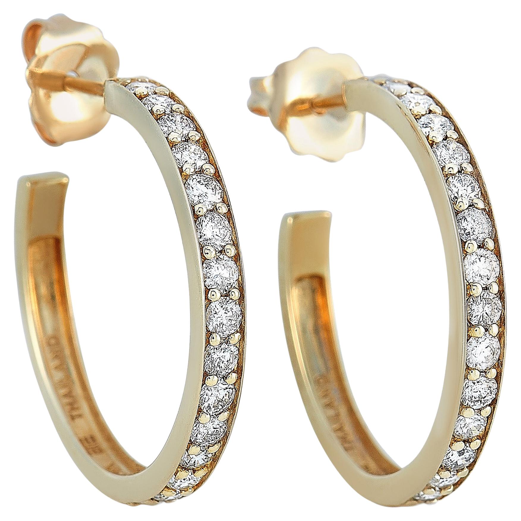 .25 Carat 14 Karat Yellow Gold Diamond Oval Hoop Earrings at 1stDibs