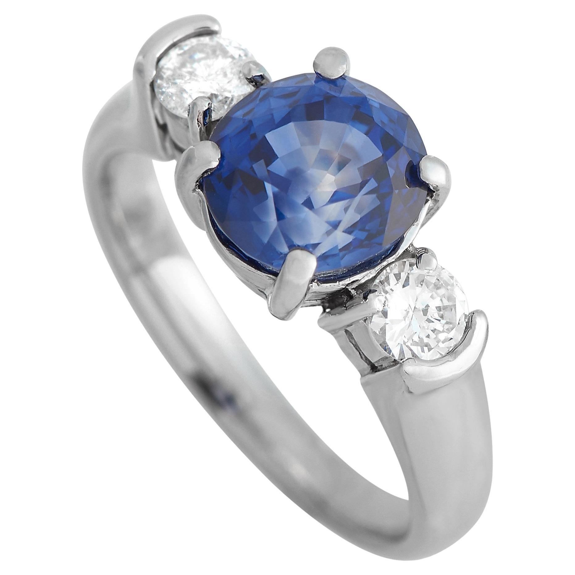 LB Exclusive Diamond and Emerald Platinum Ring at 1stDibs